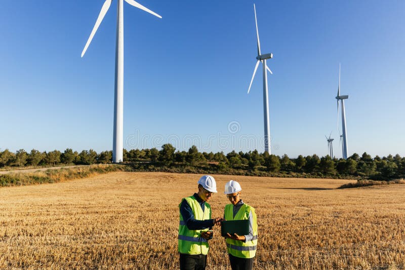 Engineers Using Energy Software on Laptop. Stock Image - Image of ...