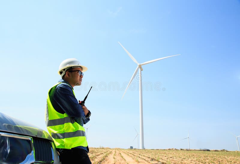 Engineers and Wind Turbines. Stock Photo - Image of wind, field: 100327716
