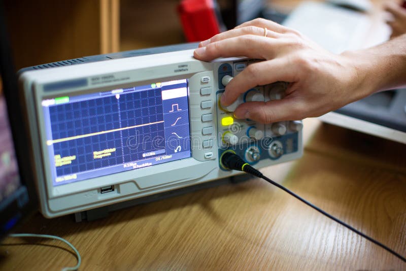 Engineers Work with Electrical Measuring Devices. Stock Image - Image ...