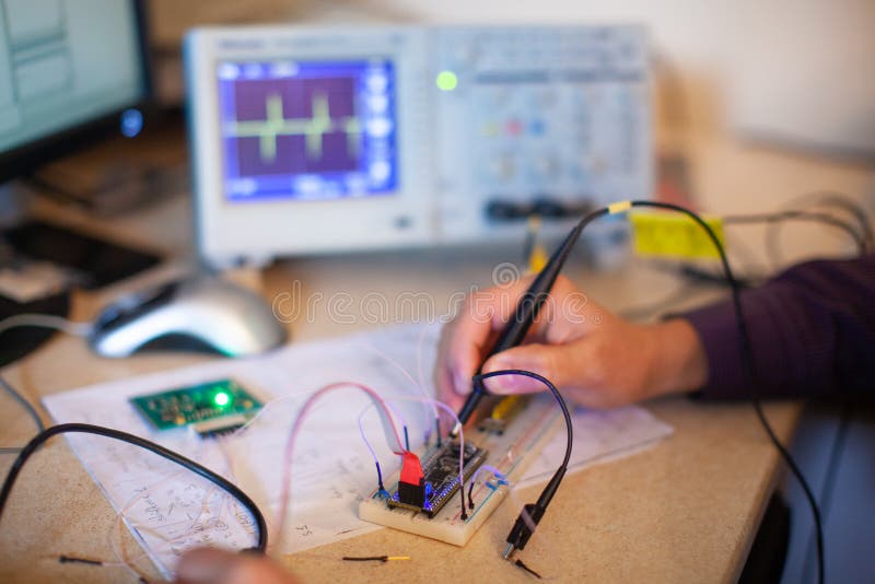 Engineers Work with Electrical Measuring Devices. Stock Photo - Image ...