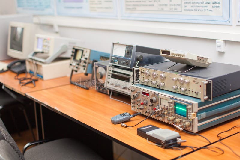 Engineers Work with Electrical Measuring Devices. Stock Image - Image ...