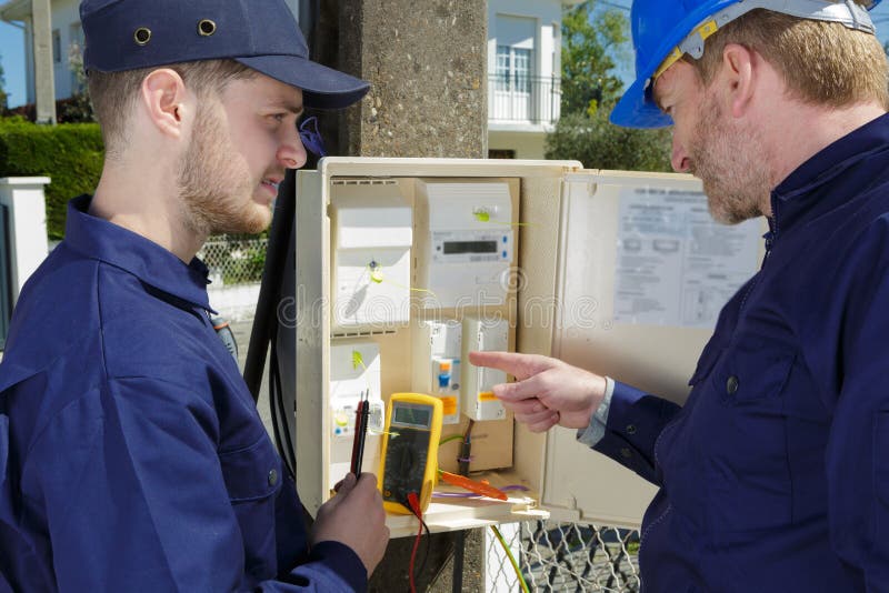 Engineers Working on Checking Voltage Stock Image - Image of array ...