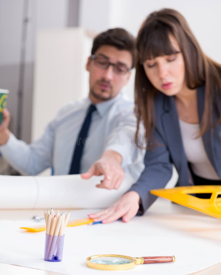 Engineers Working on New Project Stock Image - Image of draft, paper ...