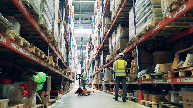 Engineers are Working on the Storage Premises Stock Video - Video of ...