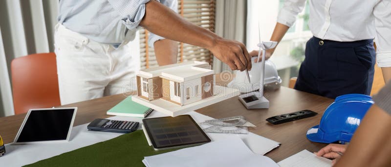 Sustainability Engineers Expertly Finalizing Project Designs at Their ...