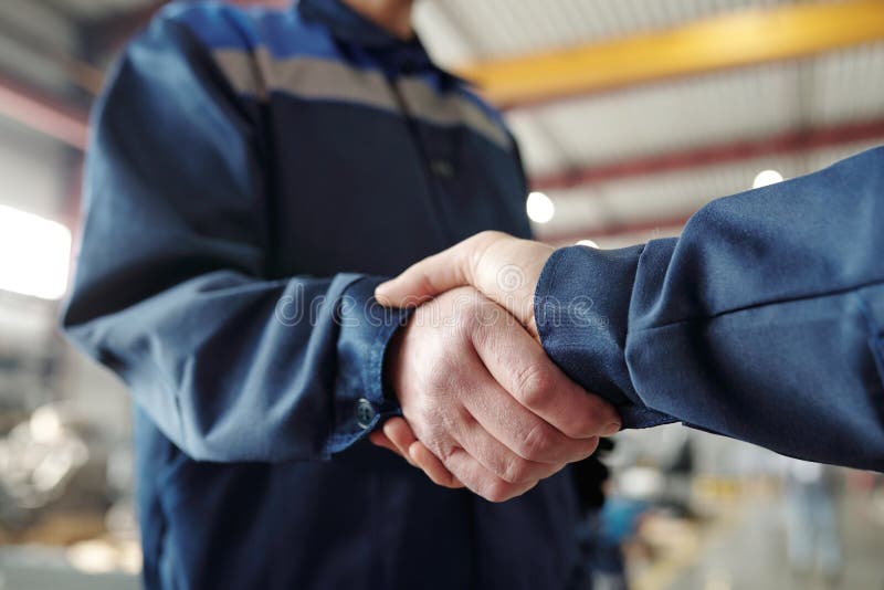 Engineers in Workwear Making Handshake Stock Photo - Image of greeting ...