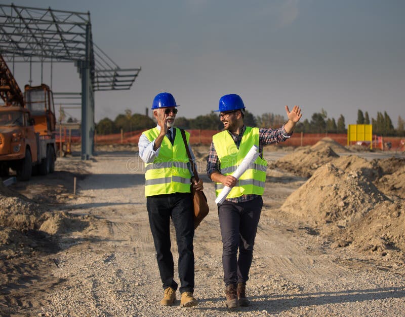 Enginers Talking at Building Site Stock Photo - Image of talking ...