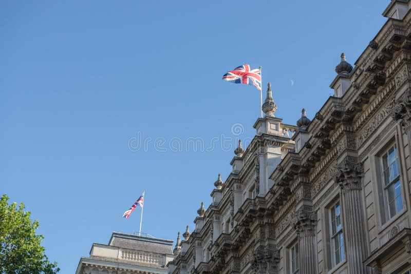 England Flag on Top of a Building Stock Photo - Image of sign, united ...