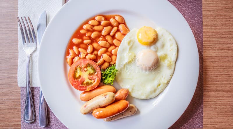 An English Breakfast on a Dining Table Stock Photo - Image of baked ...