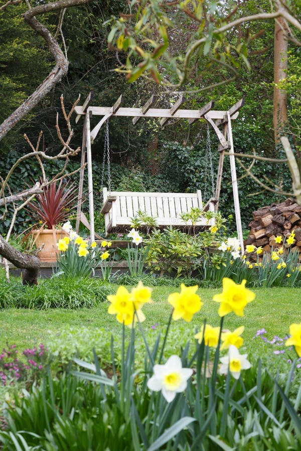 English garden in spring stock image. Image of gardens - 140616365