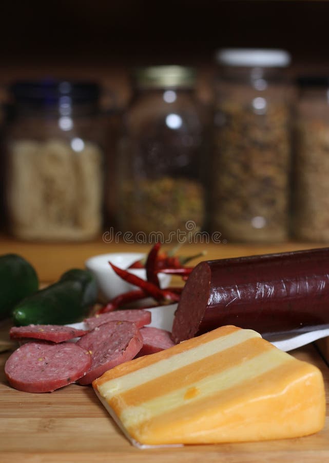 English Shires Cheese and Irish Cheese and Spices in Rustic Kitchen ...