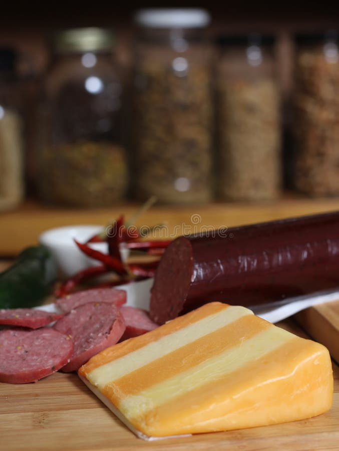 English Shires Cheese and Irish Cheese and Spices in Rustic Kitchen ...