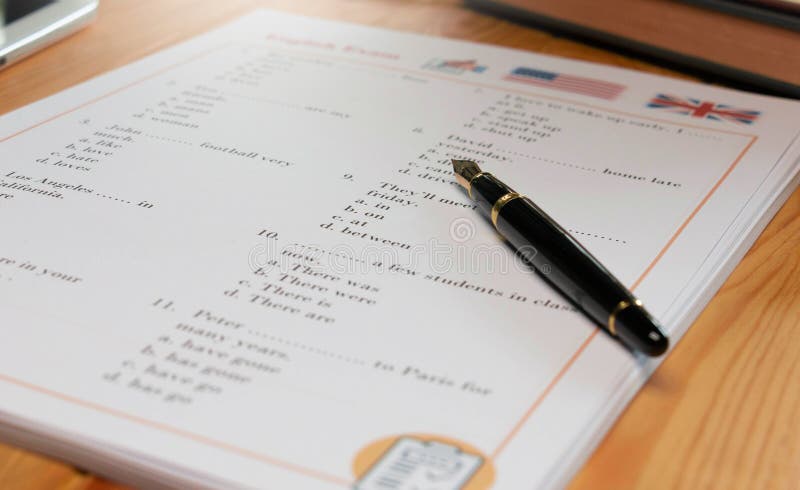 English Test with Pen on Wooden Table in Class Stock Photo - Image of ...