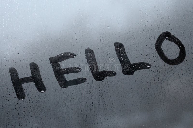 The English Word Hello is Written with a Finger on the Surface of the ...
