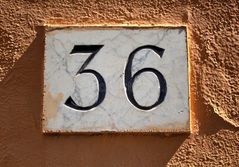 Engraved Building Number (36) Stock Image - Image of engraved, exterior ...