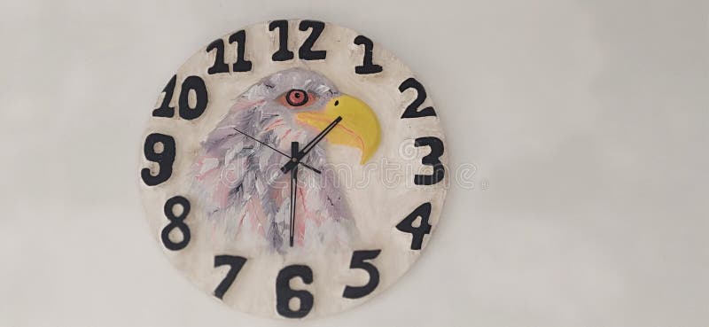 Engraved eagle Wall clock stock photo. Image of clock - 259802394