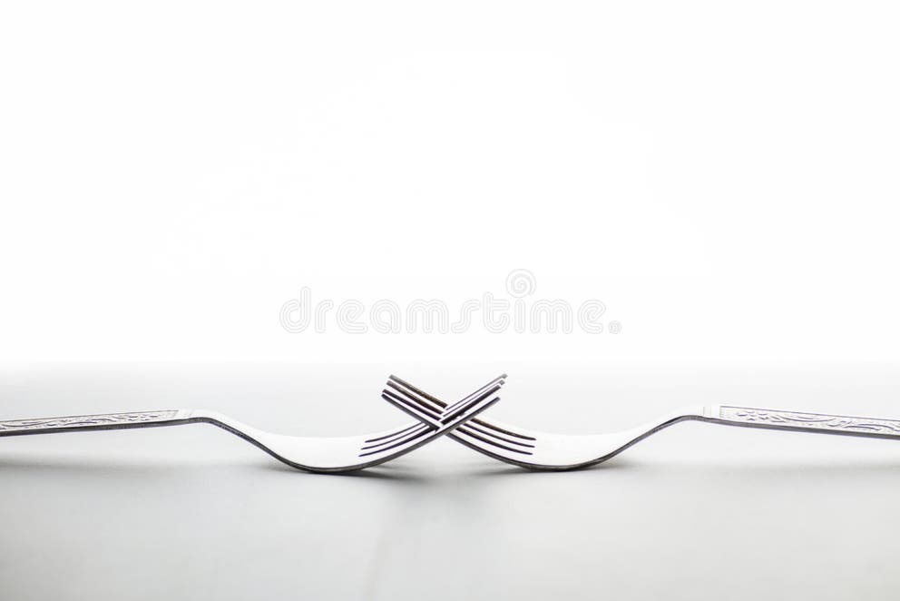 Engraved Silverware Fork Set of Two Placed Face To Face Crossing Their ...