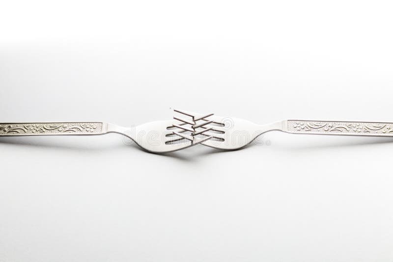 Engraved Silverware Fork Set of Two Placed Face To Face Crossing Their ...