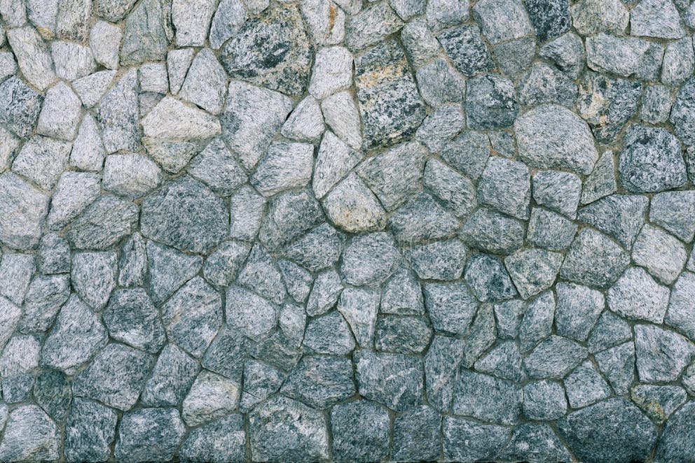 Engraved Stone Brick Wall Texture Pattern Background Stock Photo ...