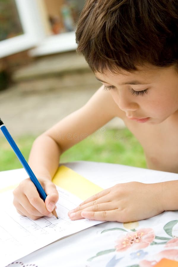 Engrossed in his writing stock photo. Image of caucasian - 2725150