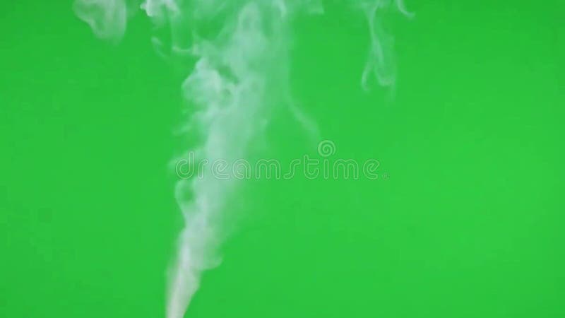 White Smoke on Green Screen, Smoke Rising Over Black with Green Screen ...