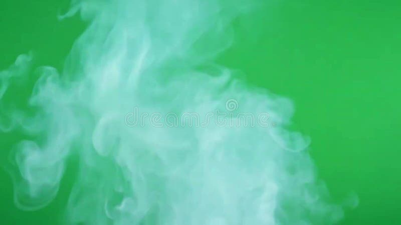 White Smoke on Green Screen, Smoke Rising Over Black with Green Screen ...