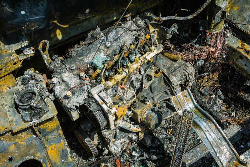 Engine of a burned car stock photo. Image of background - 117979342