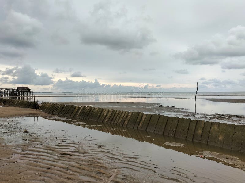 Enjoy Afternoon Situation of Beautiful Beach from Behind Breakwater ...