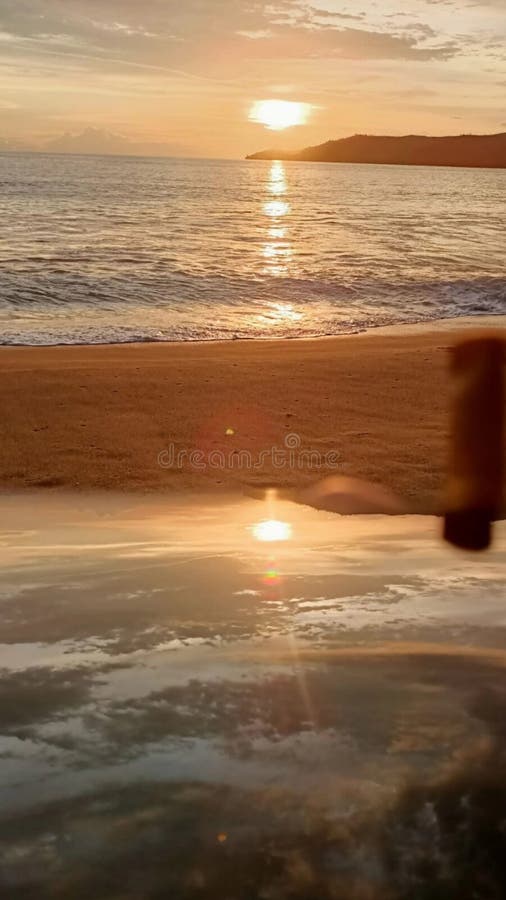 Enjoy the Beautiful Sunset on the Beach Stock Photo - Image of sand ...