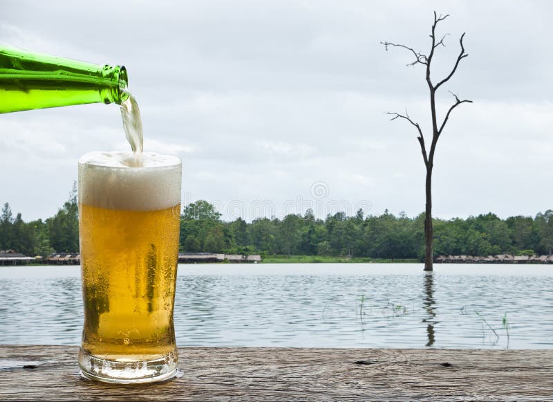 Enjoy beer with nice view. stock image. Image of glass - 39516903