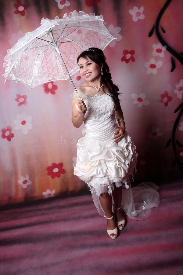 She is enjoy bride stock photo. Image of hold, flowers - 25132656