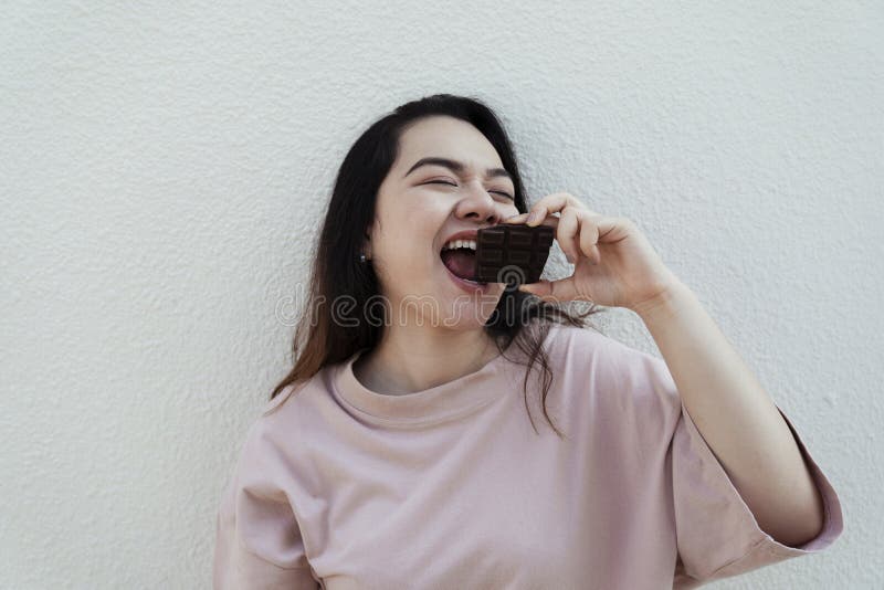 Enjoy eating chocolate stock photo. Image of food, careless - 180305810