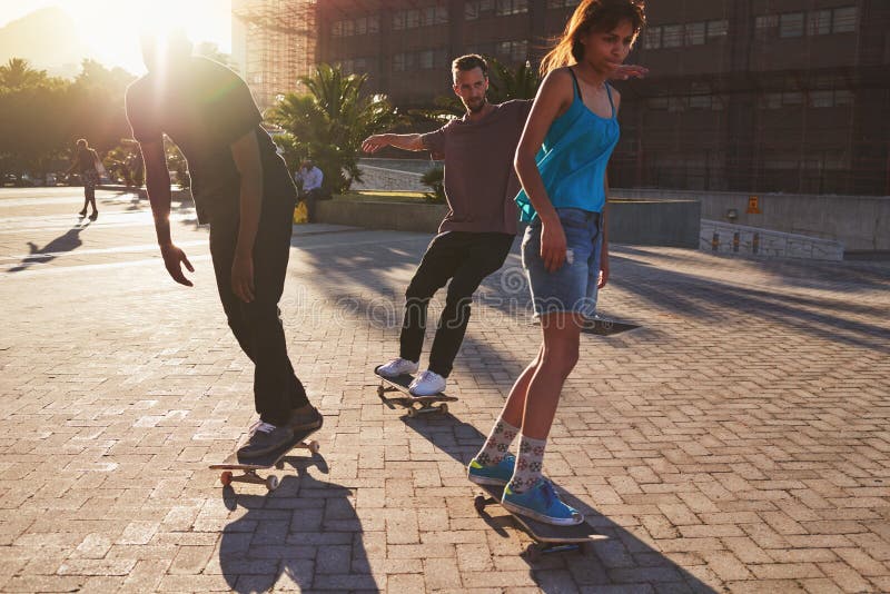 Enjoy Every Moment. a Group of Skaters Skating in the City. Stock Photo ...