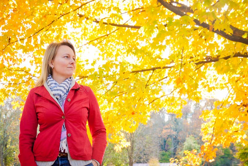 Enjoy the Fall with Me stock photo. Image of fall, coat - 27515404