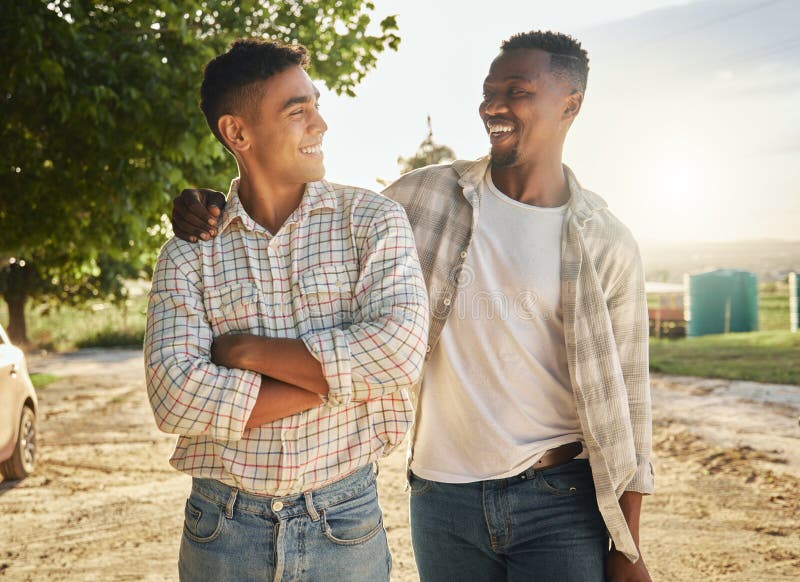 They Enjoy the Field Work. Two Young Farmers Standing Outside. Stock ...