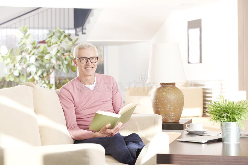 Enjoy a good book stock image. Image of book, happy, handsome - 90800505