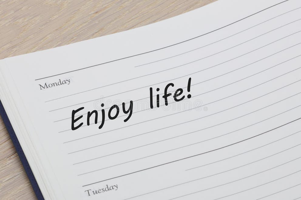 Enjoy Life Reminder Message in an Open Diary Stock Photo - Image of ...