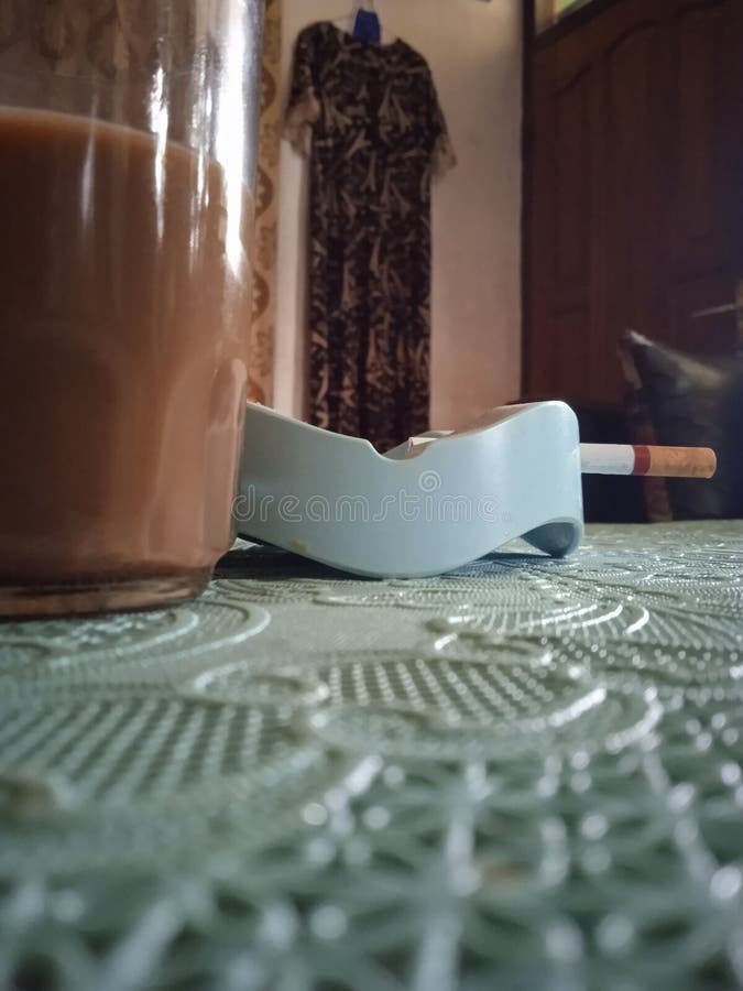 Enjoy the Morning with a Cup of Coffee and a Cigarette Stock Photo ...