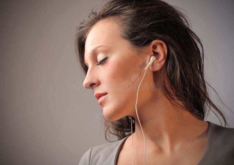 Enjoy music stock image. Image of earphones, stereo, girl - 23085823