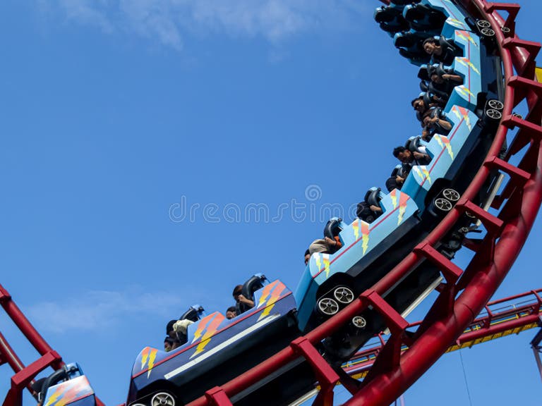 Enjoy the Roller Coaster Ride with Blue Sky Background Stock Photo ...