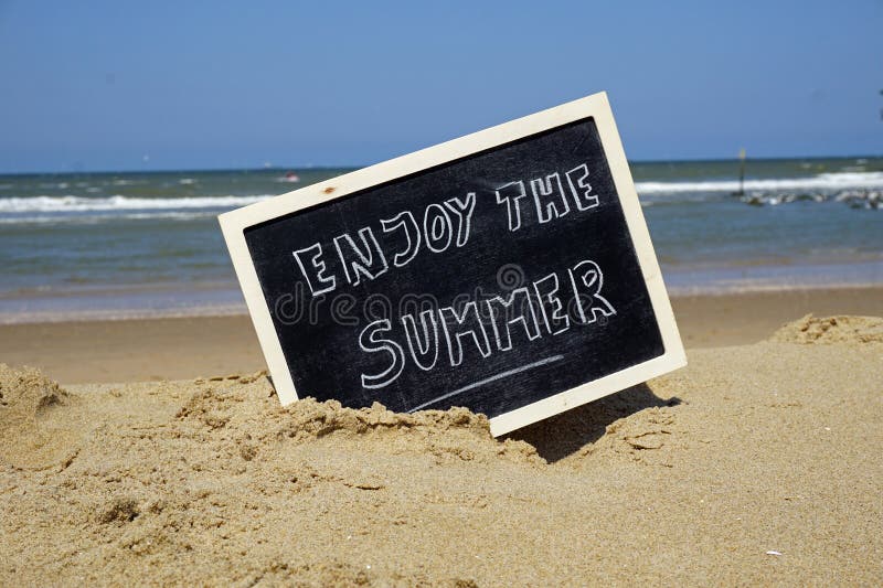 Enjoy the summer written stock photo. Image of shell - 280492738