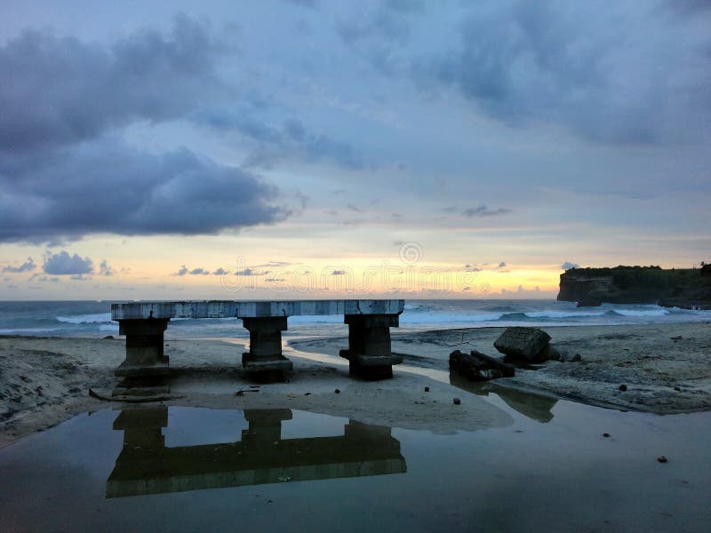 Enjoy the Sunset on the Beach Klayar Pacitan Stock Image - Image of ...