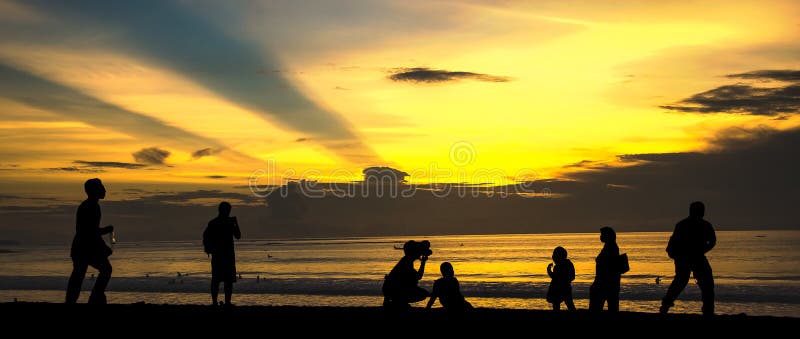 Enjoy sunset at Kuta Beach stock image. Image of happiness - 61801933