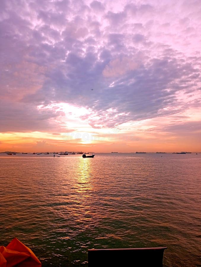 Enjoy the Sunset Over the Sea from the Pier Stock Photo - Image of pier ...