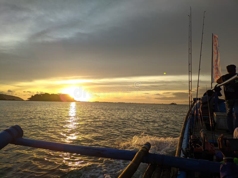 Enjoy the Sunsets while Fishing Editorial Photography - Image of beach ...