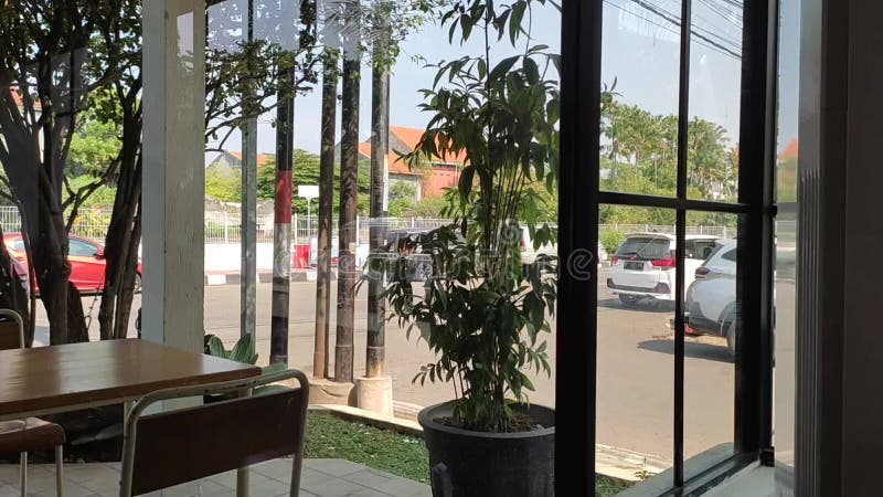 View in Front of the Cafe from Behind the Glass Window Stock Video ...