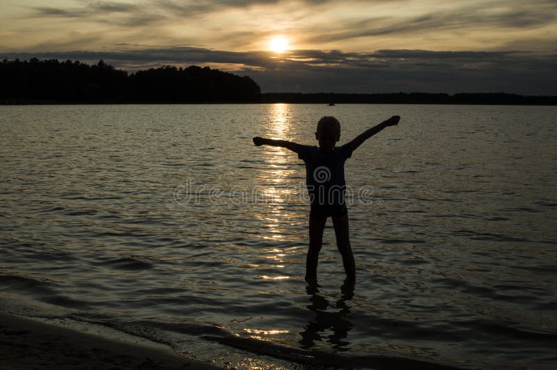 Sunset shadows. stock photo. Image of children, shadows - 156742962