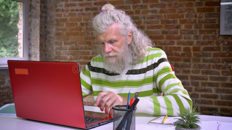 Enjoyable Old Caucasian Man with Thick White Beard Typing on His ...