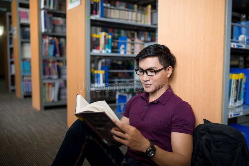 Enjoying a book reading stock photo. Image of reading - 51026516