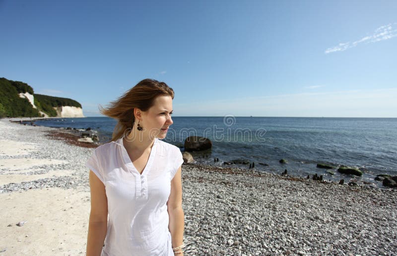 Enjoying the breeze stock image. Image of sunshine, pebble - 13736991